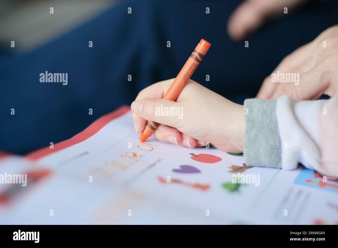 young girl practicing her writing skills Stock Photo - Alamy