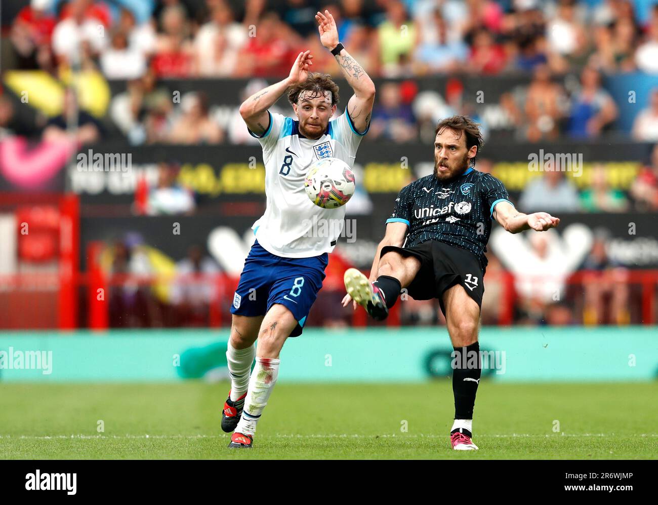 England's Tom Grennan (left) and Soccer Aid World XI's Sam Claflin ...