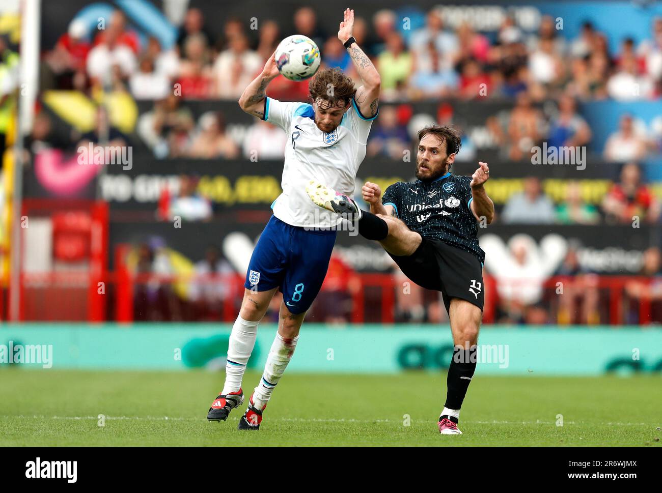 England's Tom Grennan (left) and Soccer Aid World XI's Sam Claflin ...