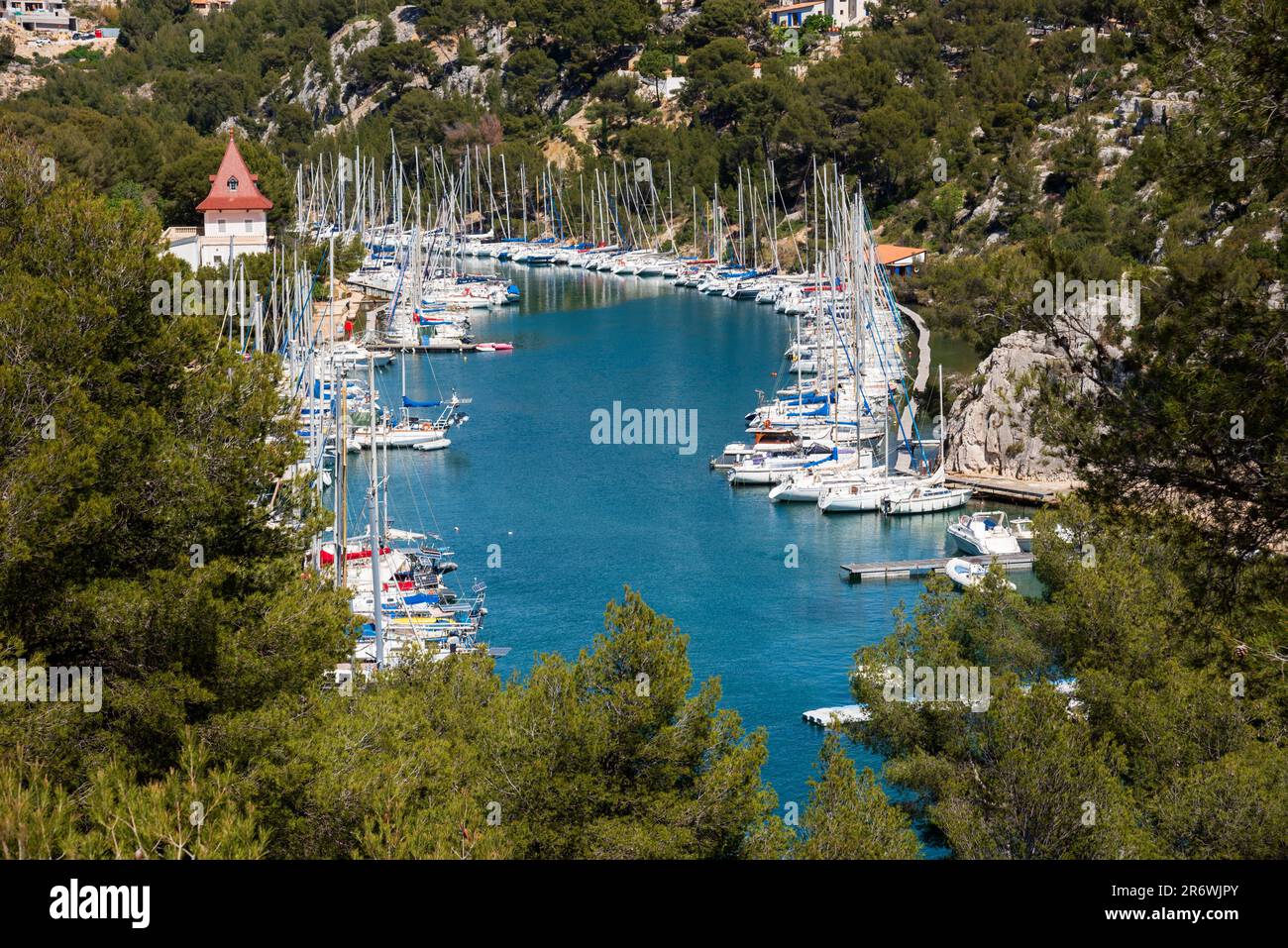 View of sailing boats mooring in marina of Calanque de Port-Miou ...