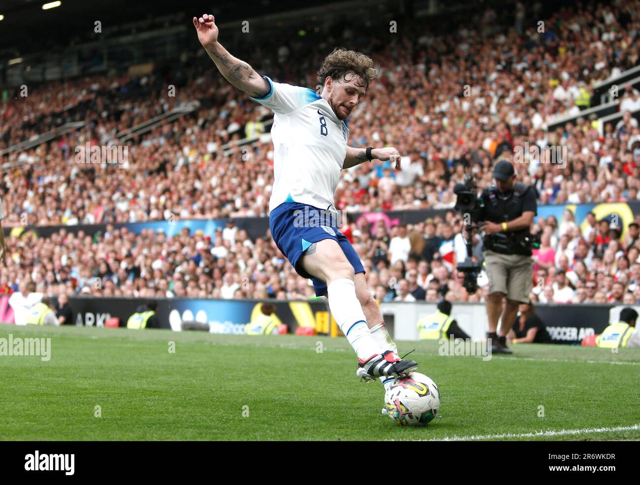England's Tom Grennan in action during Soccer Aid for UNICEF 2023 at ...