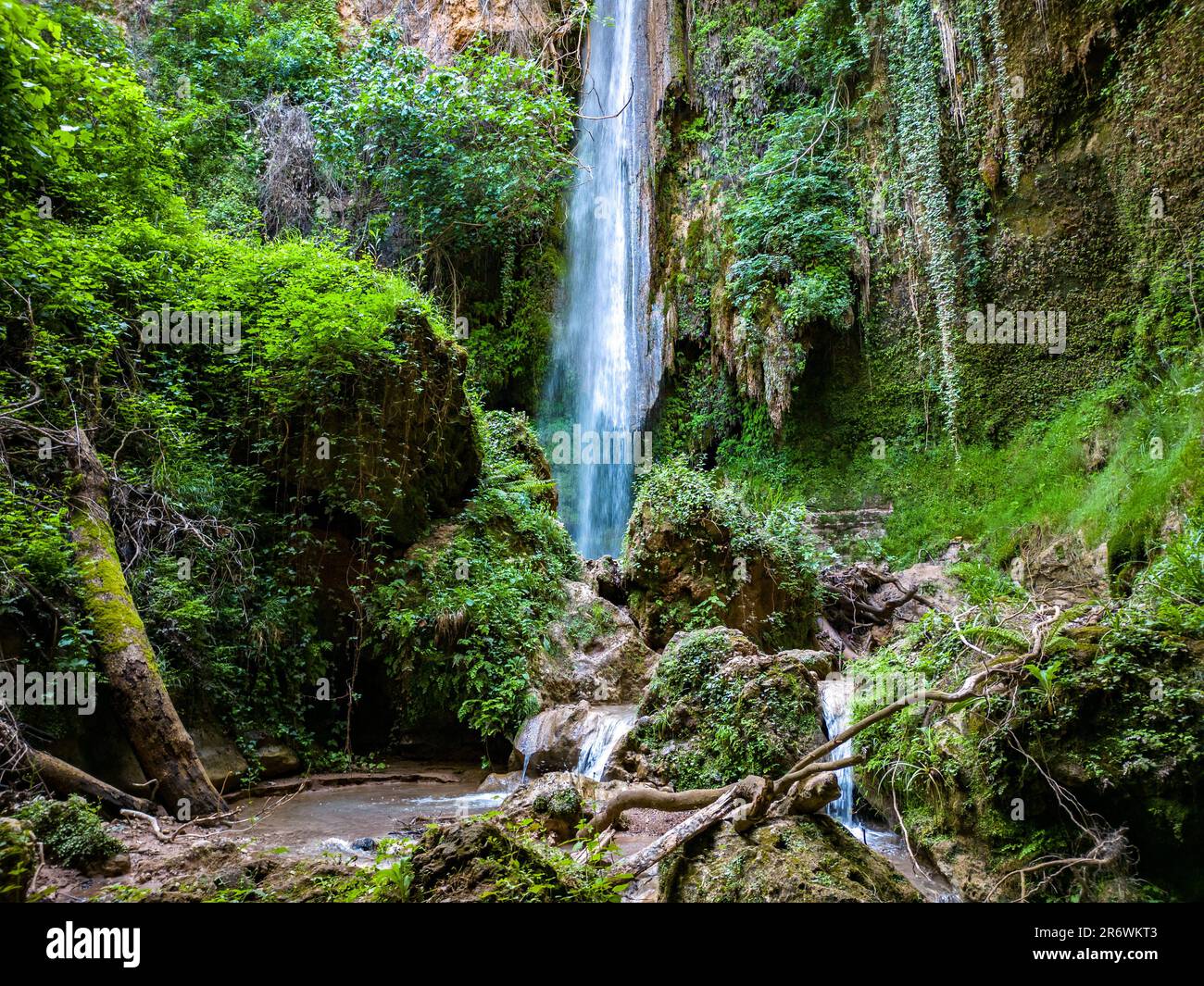 Waterfall of Nemouta in Peloponnese in Greece in a green gorge and cave ...