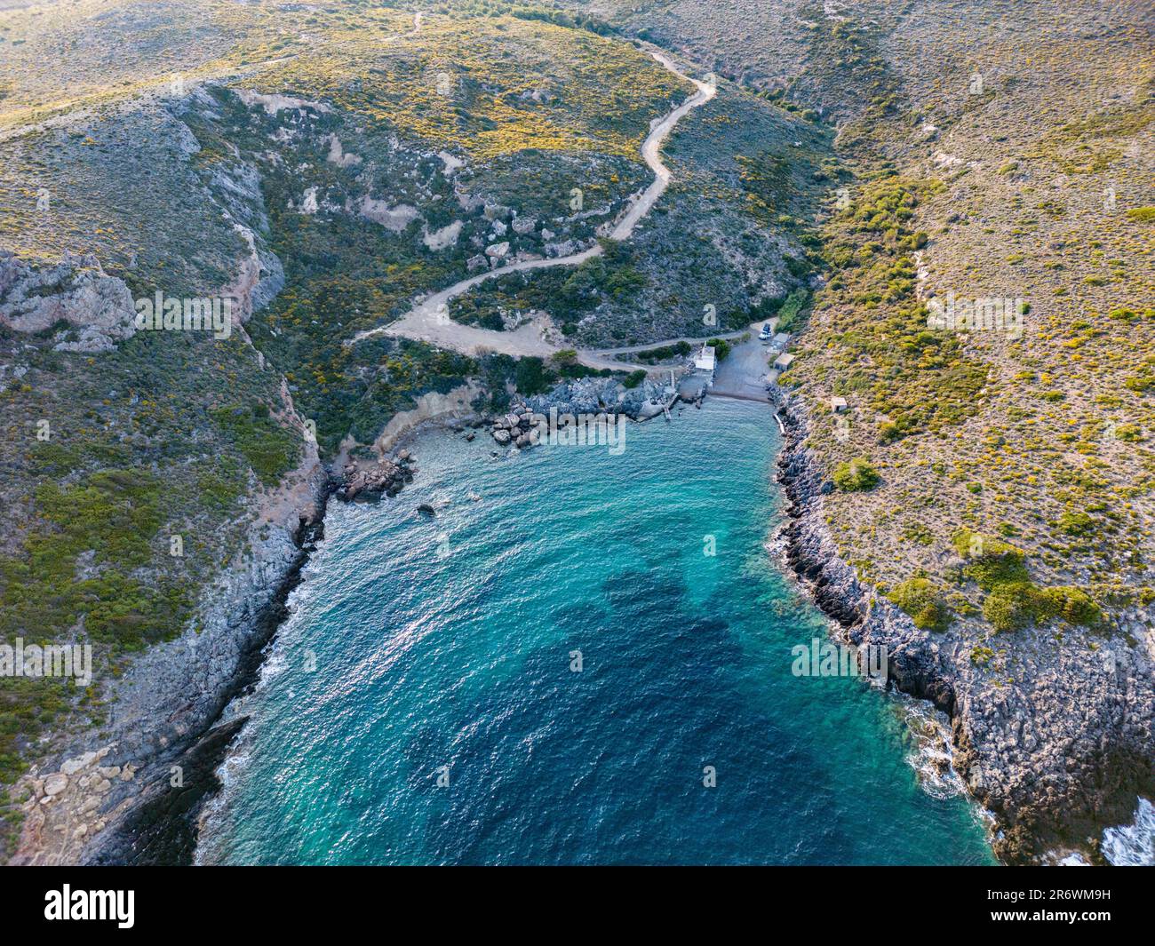 Blue bay with clear water at Vroulea beach on the Greek island of ...