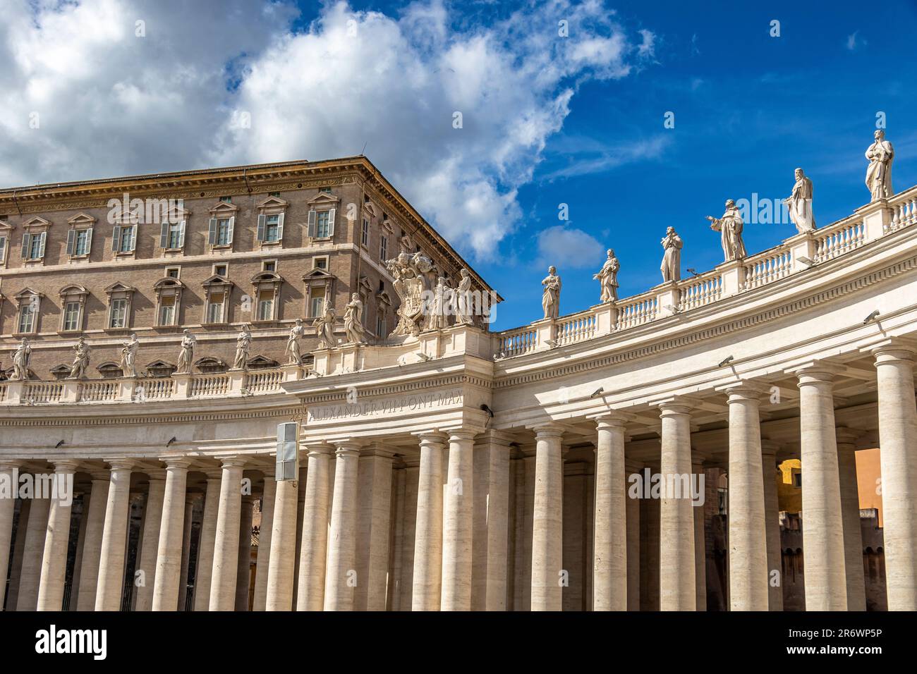 Close up of the The Doric colonnades with statues of Saints watching over the Square, St. Peter ...