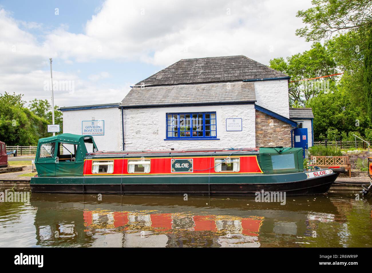 Canal narrowboat passing through the South Wales village of Govilon on ...