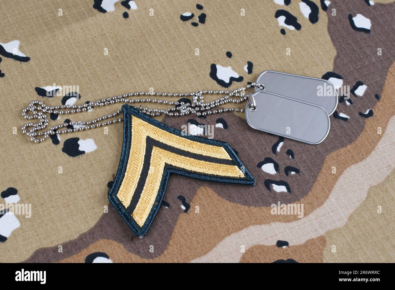 May 12, 2018. US ARMY Corporal rank patch and dog tags on desert ...