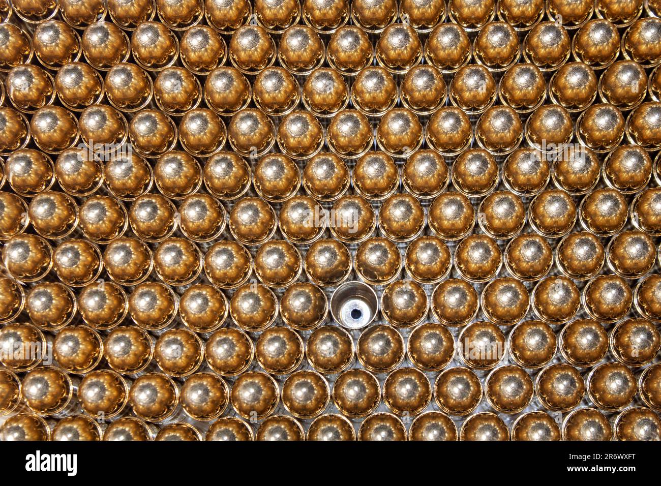 many cartridges, photo from above, one bullet is missing Stock Photo ...