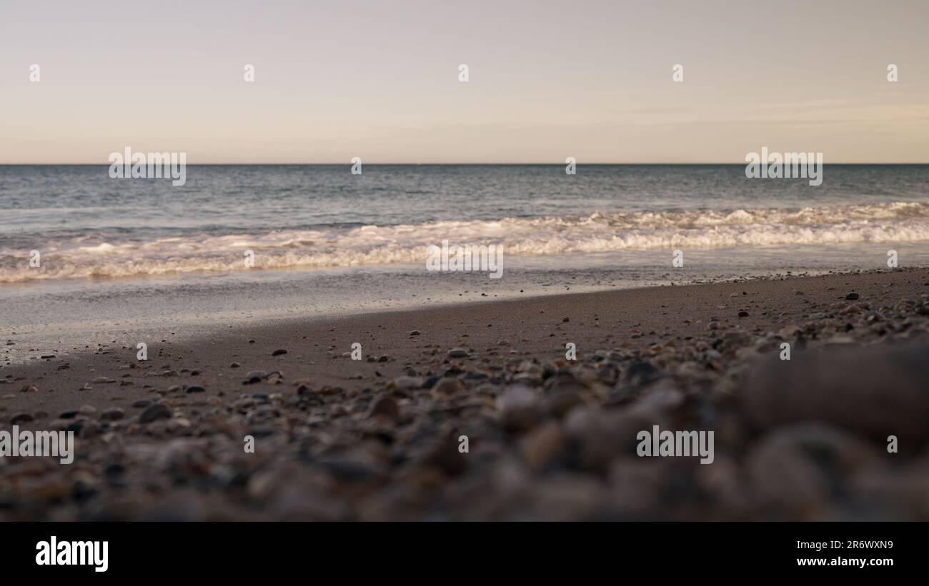shot of Antibes beach on a warm spring evening, wide photo Stock Photo ...