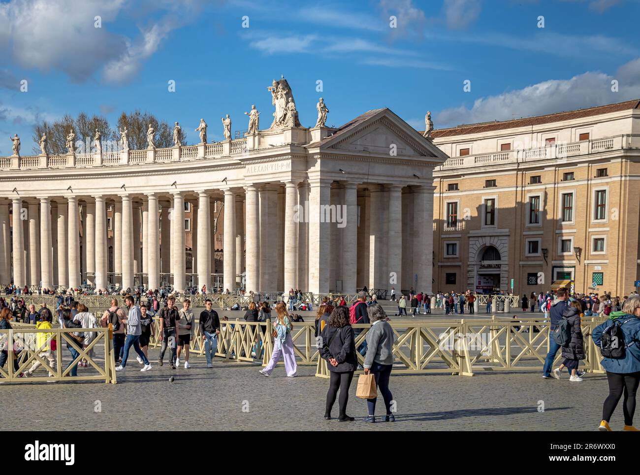 People at St Peter's Square, a large plaza located directly in front of ...