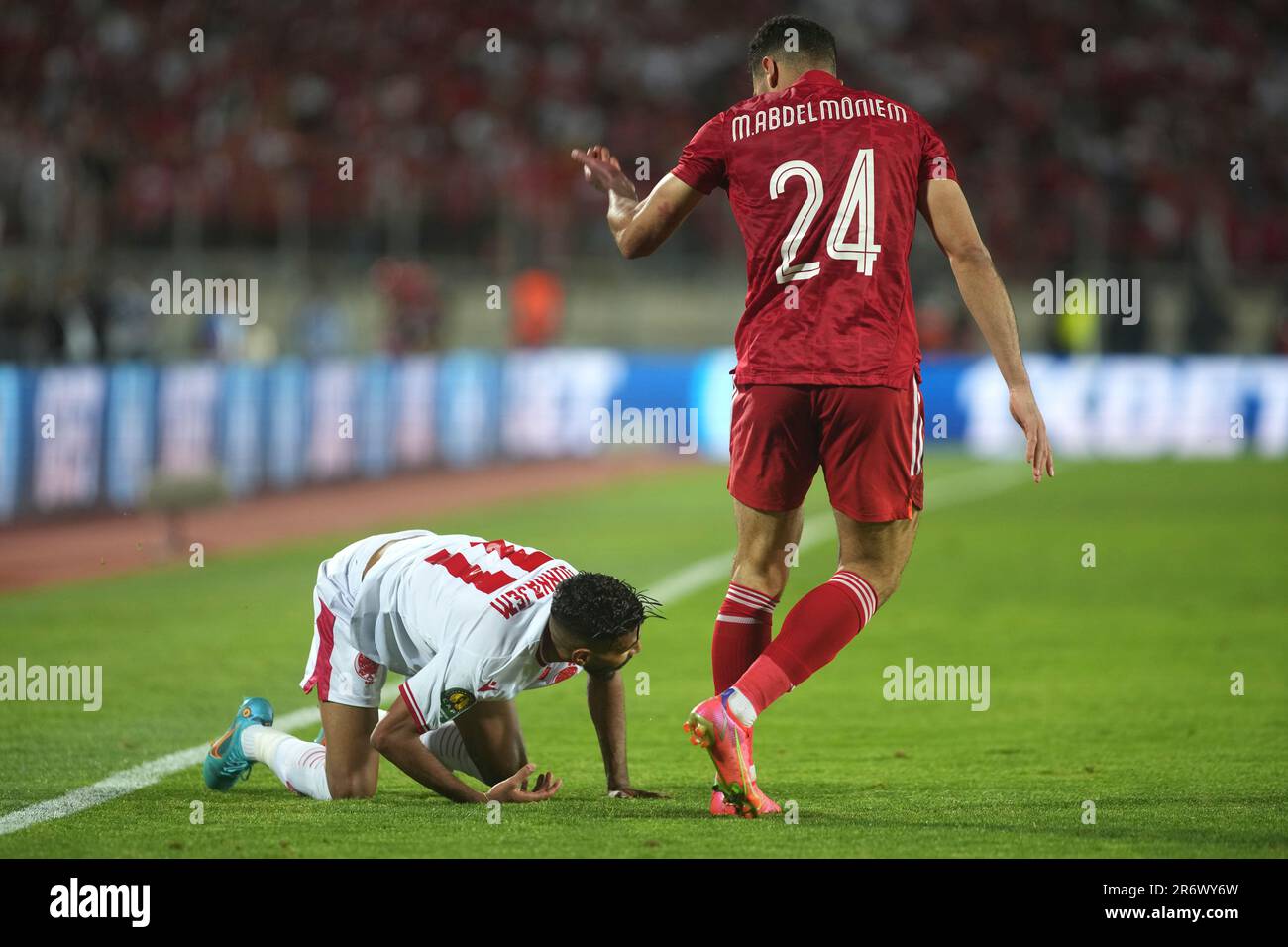 Al Ahly's Mohamed Abdelmonem, right, and Wydad's Mohamed Ounajem during the CAF Champions League ...