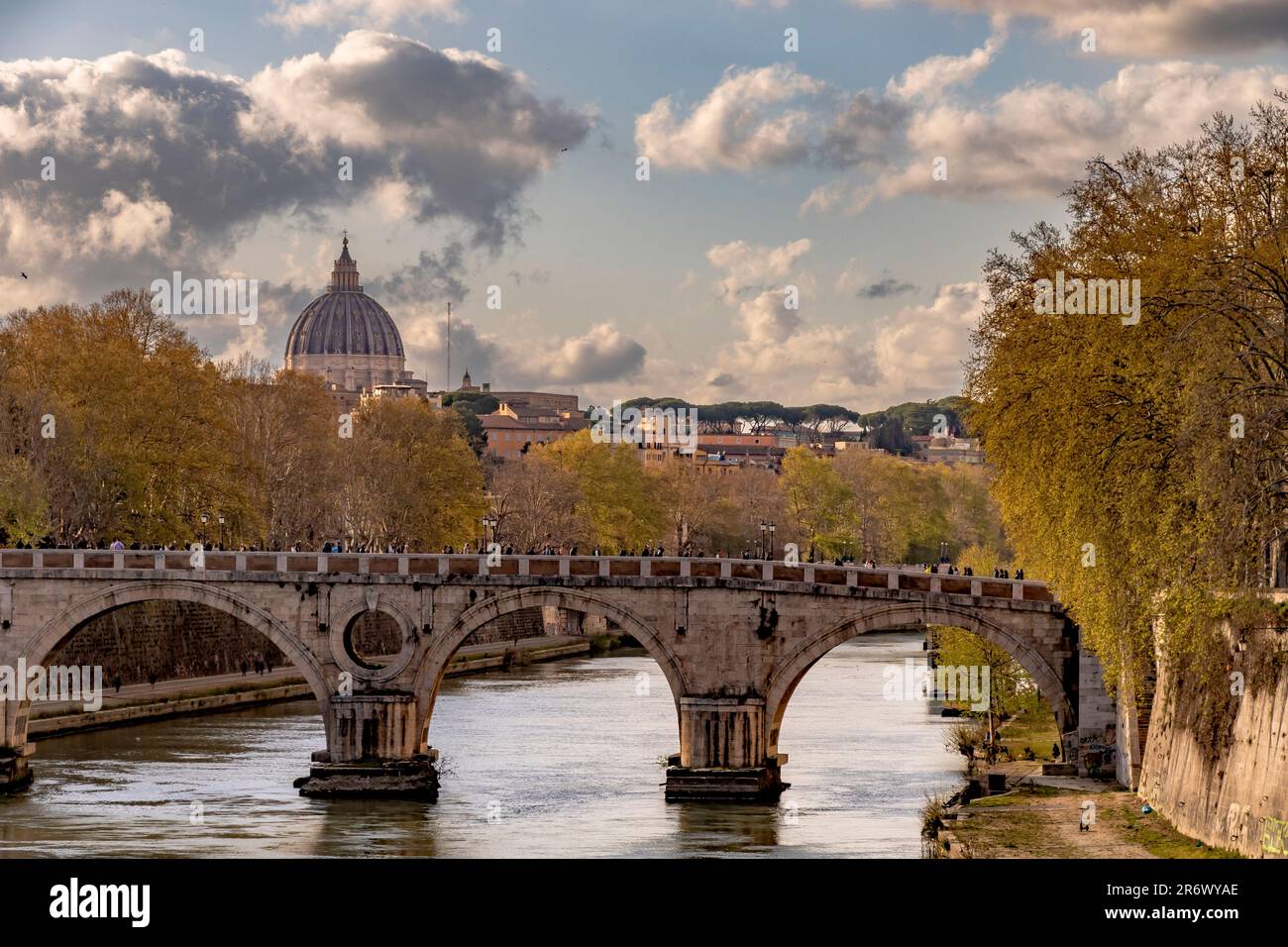 The Ponte Sisto Bridge spanning the River Tiber with the dome of St ...