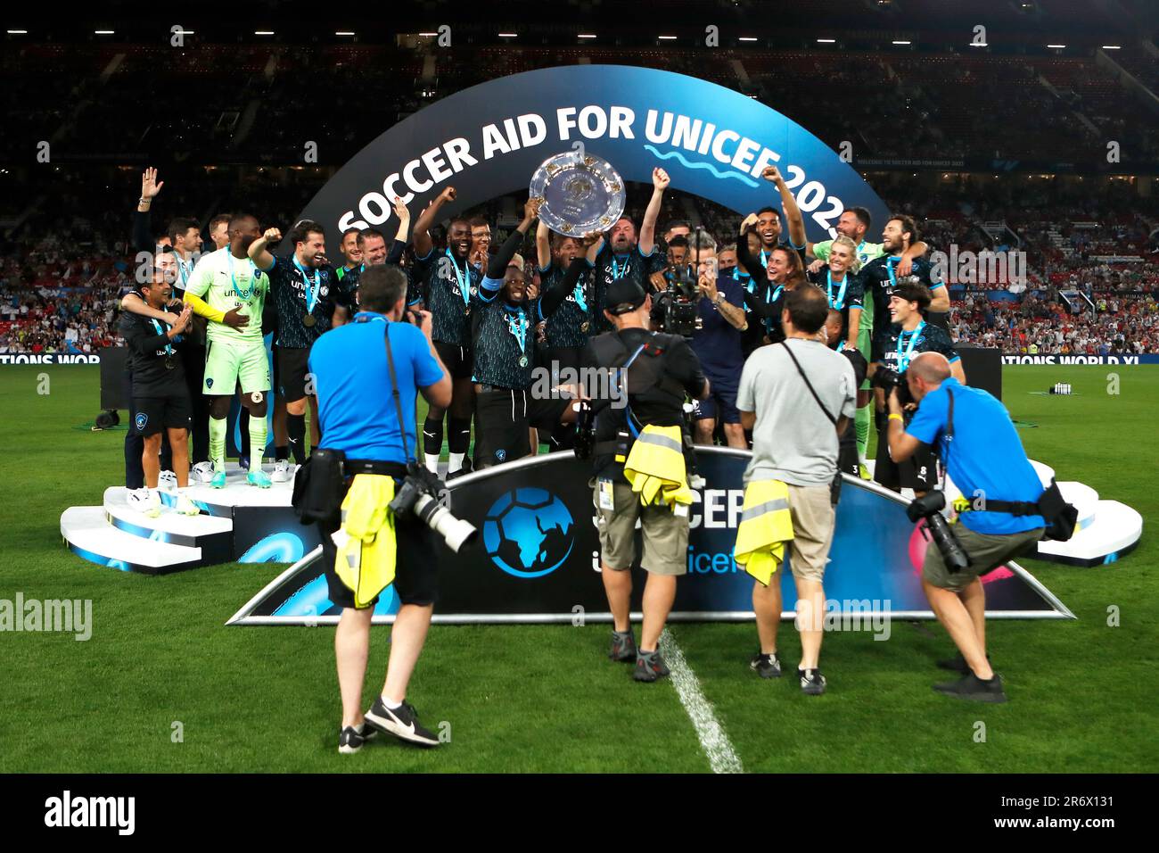 Soccer Aid World XI's Usain Bolt lifts the trophy, following victory in ...