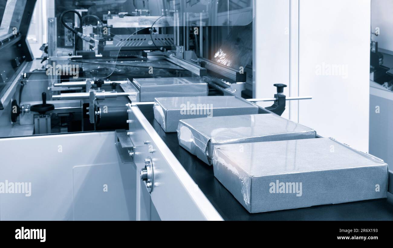 Automatic industrial machine for plastic packaging with light effect of ...