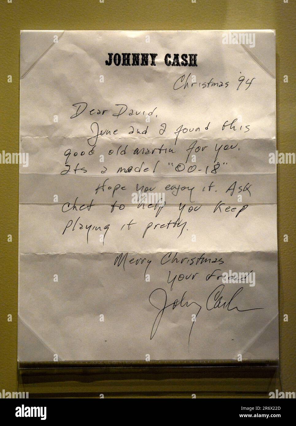 A handwritten letter written by Johnny Cash to a friend on display at ...