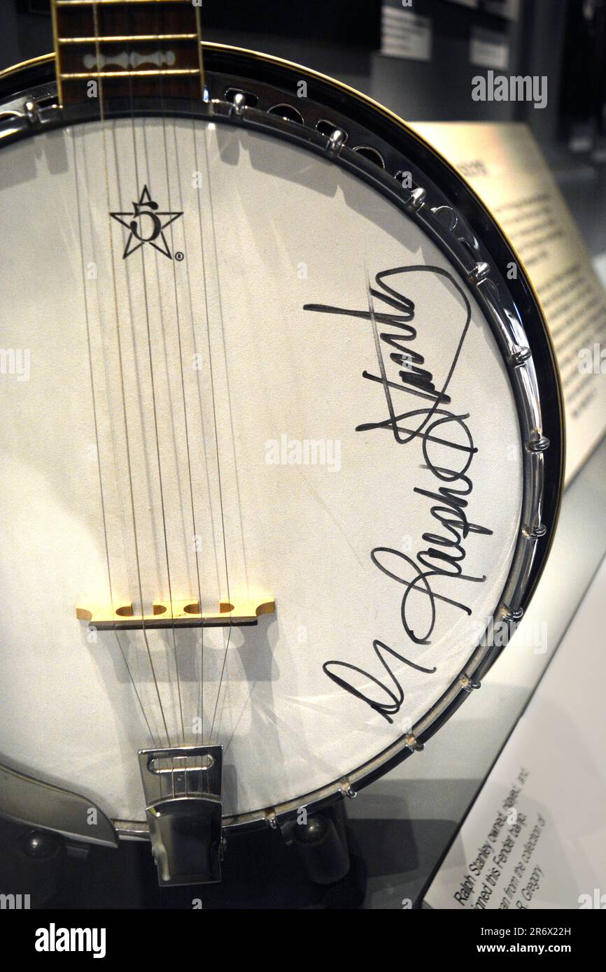 An autographed banjo played by bluegrass pioneer Ralph Stanley on ...