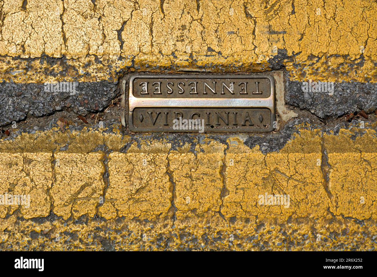 A metal marker embedded in the middle of State Street in Bristol ...
