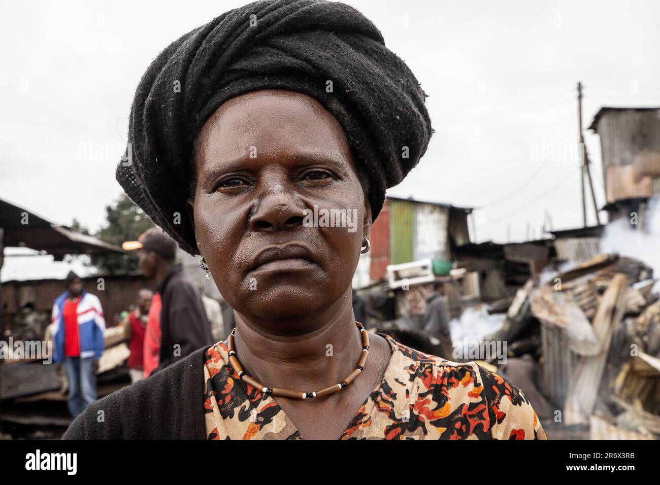 Nairobi, Kenya. 11th June, 2023. A trader desperately stands by her ...