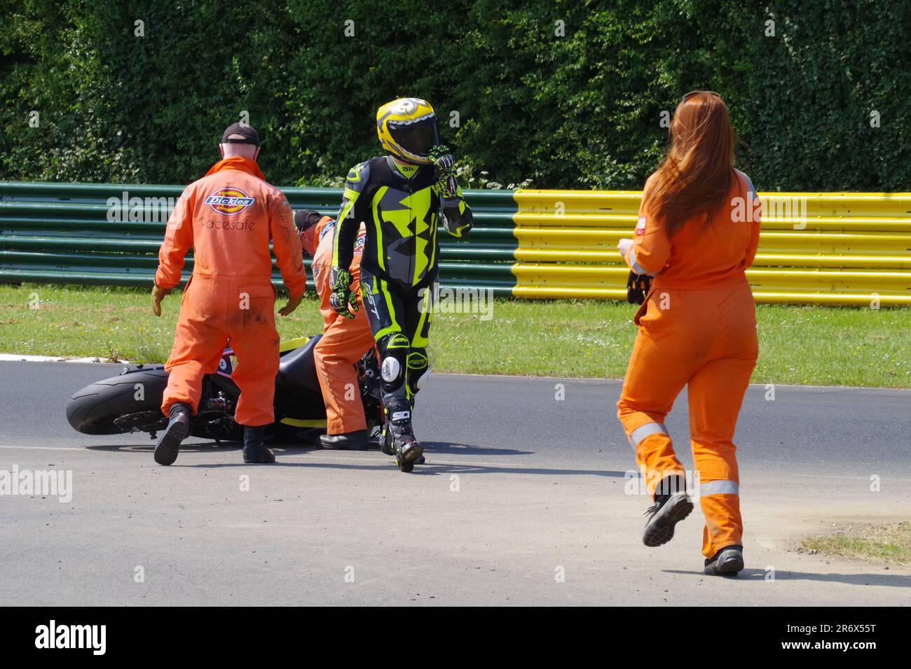 Croft Circuit, 10 June 2023. Marshalls helping Matt Hanton who crashed ...