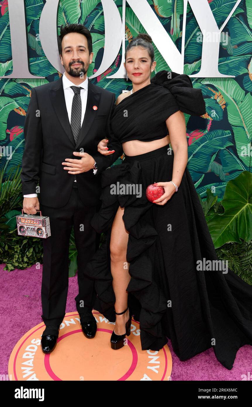 Lin-Manuel Miranda, wearing a pin in support for the WGA strike, left ...