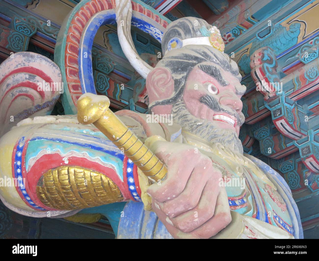 Close-up of the statue of Virudhaka with his sword, one of the Four ...