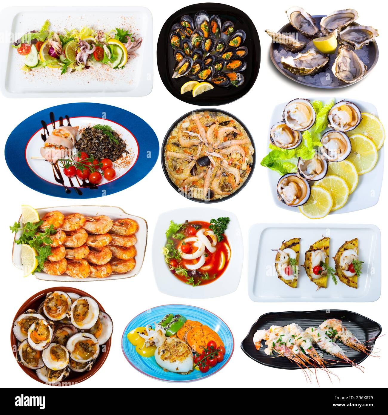 Plates of seafood on white background Stock Photo - Alamy