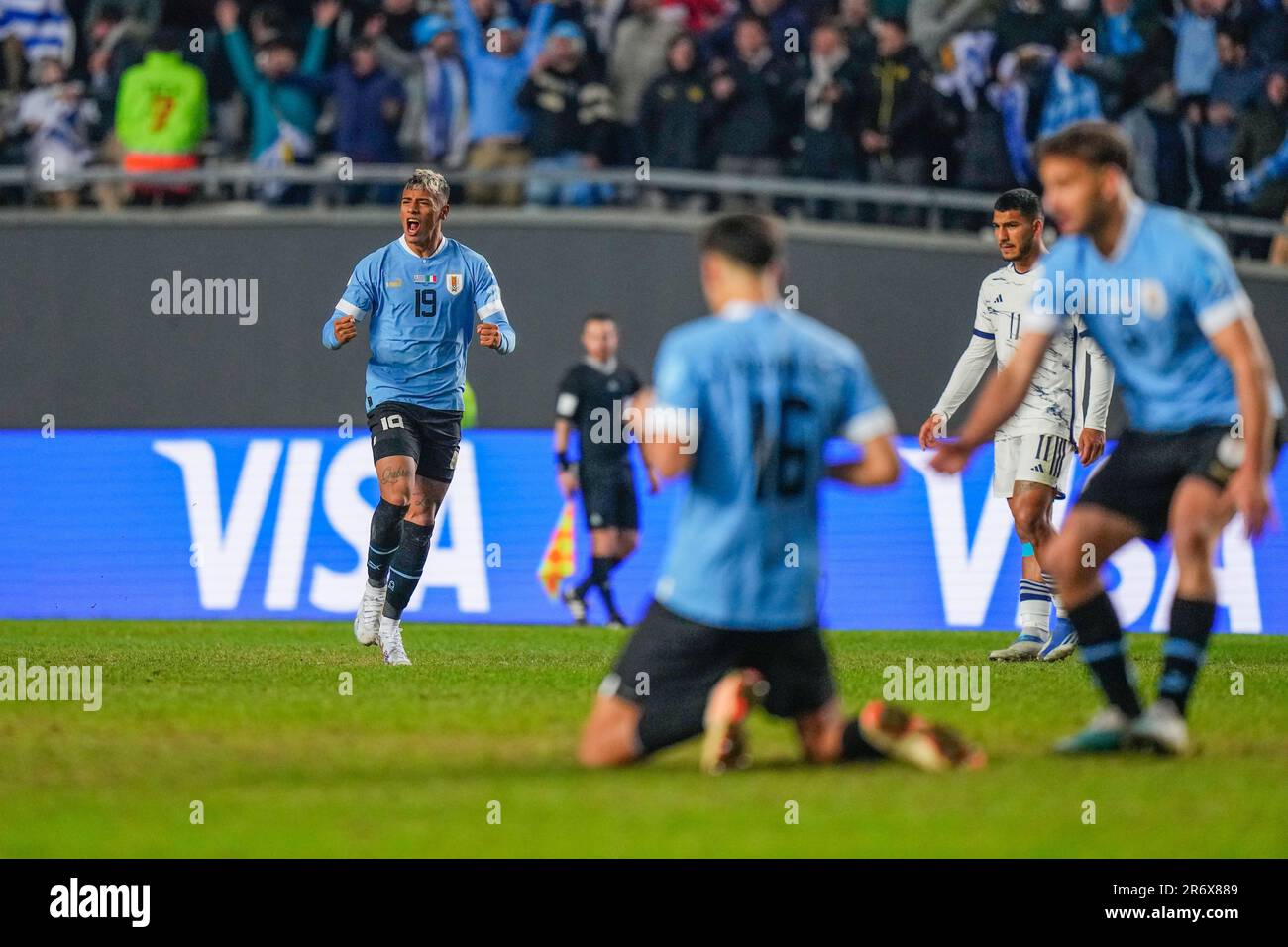 Uruguay's Luciano Rodriguez, left, celebrates scoring his side's ...