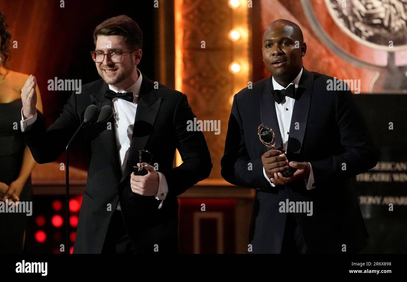 Charlie Rosen, left, and Bryan Carter accept the award for best ...