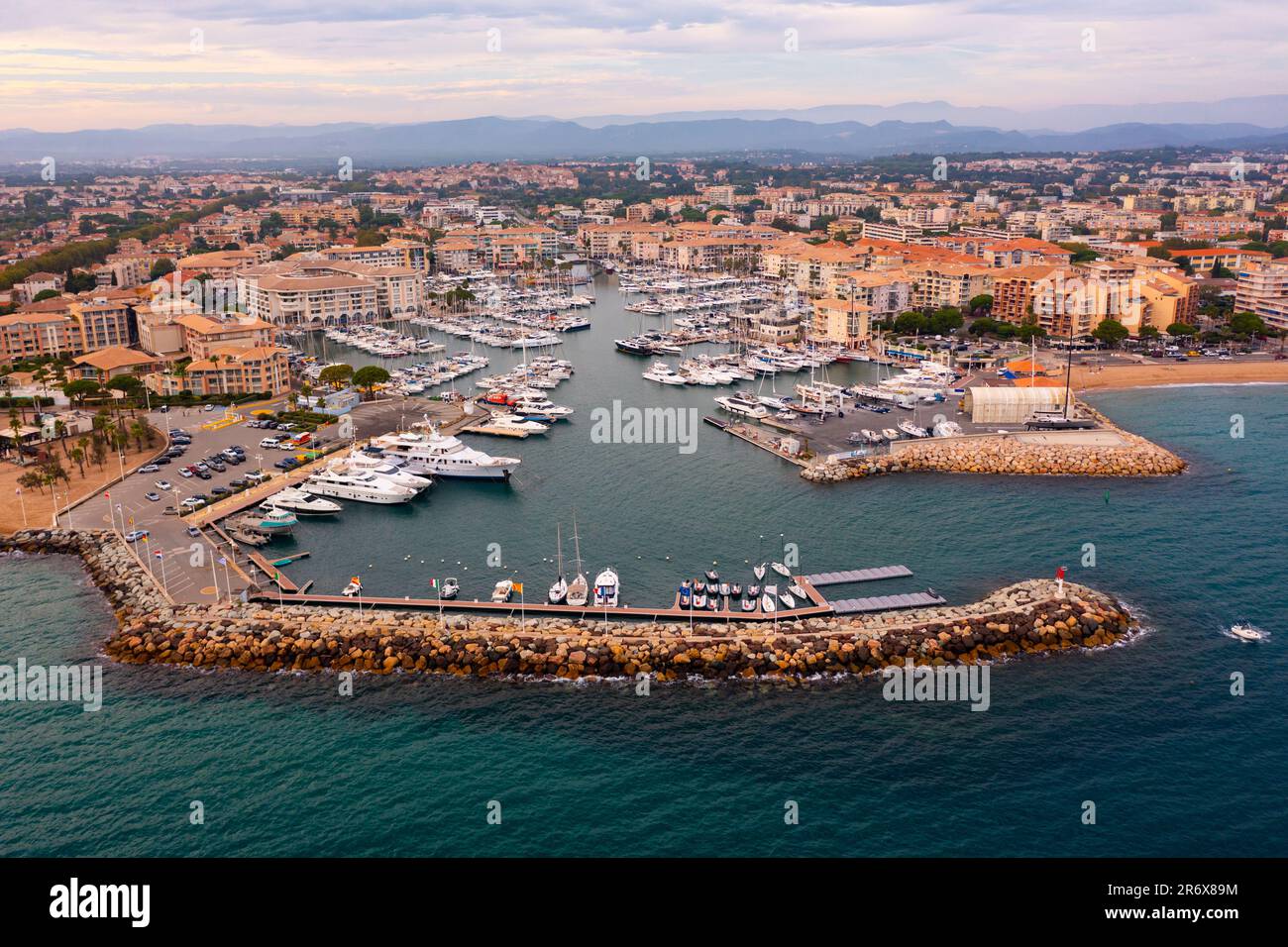 Aerial view of Frejus cityscape on Mediterranean coast with marina ...