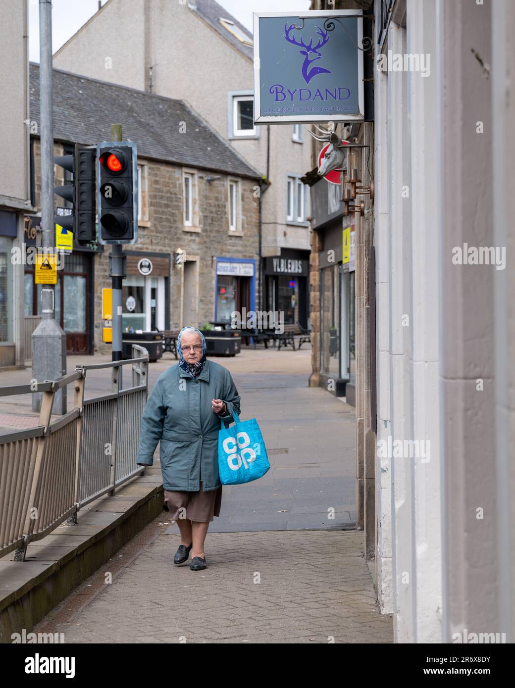 9 June 2023. Thurso,Scotland. This is an elderly Lady out shopping in ...
