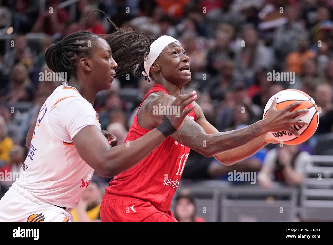 Indiana Fever's Erica Wheeler (17) looks to shoot against Phoenix ...