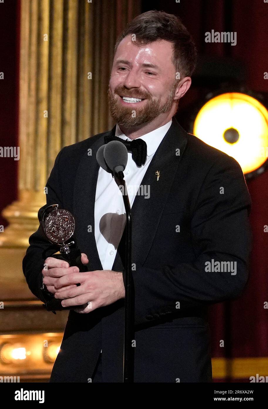 Tim Lutkin accepts the award for best lighting design of a play for ...