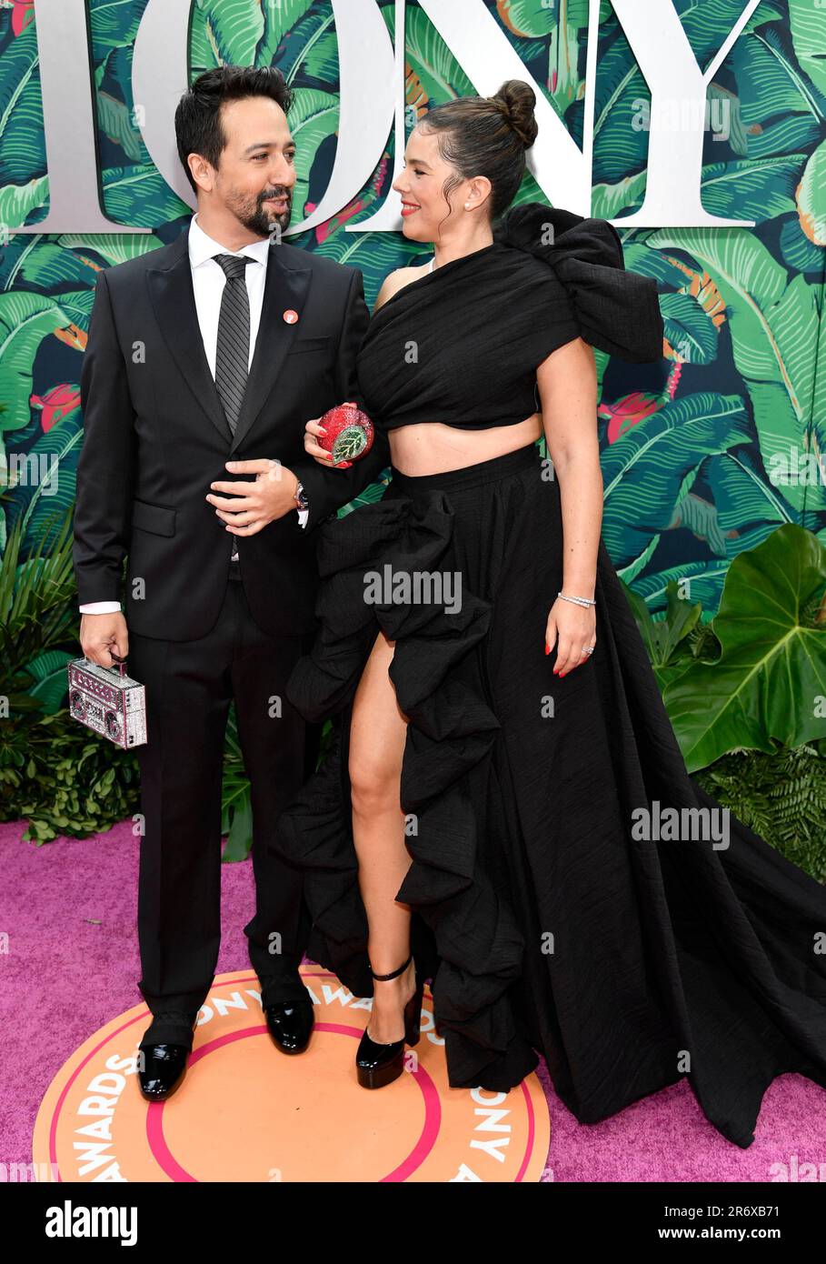 Lin-Manuel Miranda, left, wearing a pin in support for the WGA strike ...
