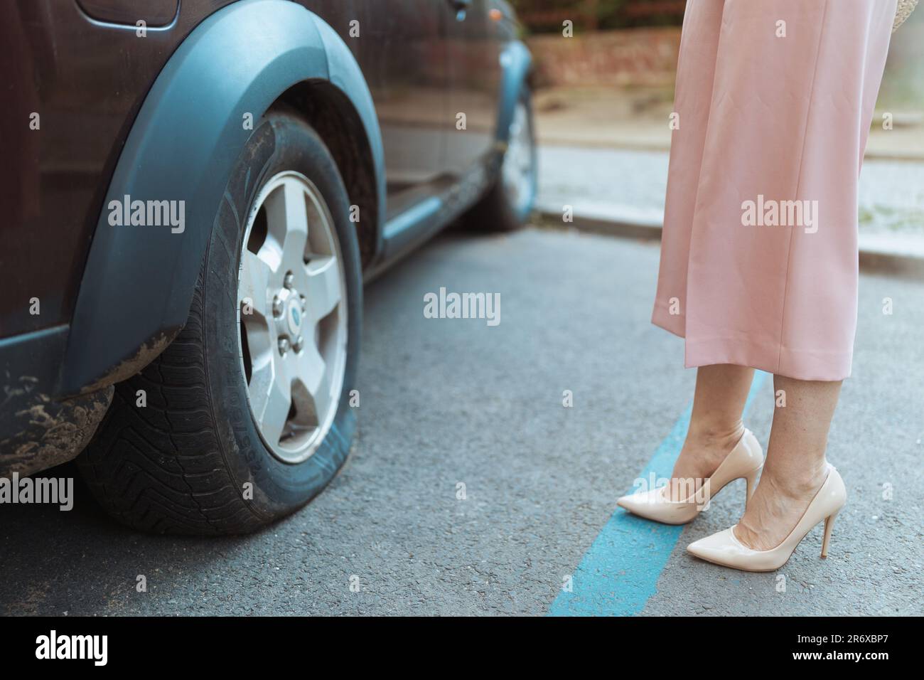 Woman flat tire in car hi-res stock photography and images - Alamy