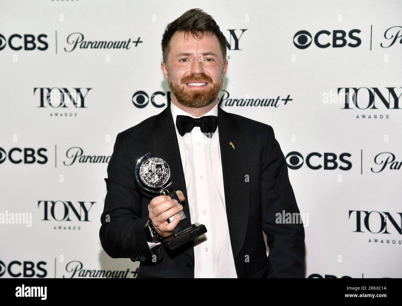Tim Lutkin poses in the press room with the award for best lighting ...
