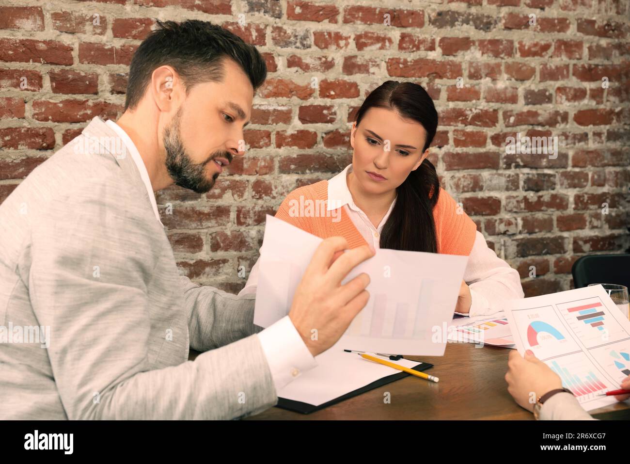 Focused startup team working together hi-res stock photography and ...