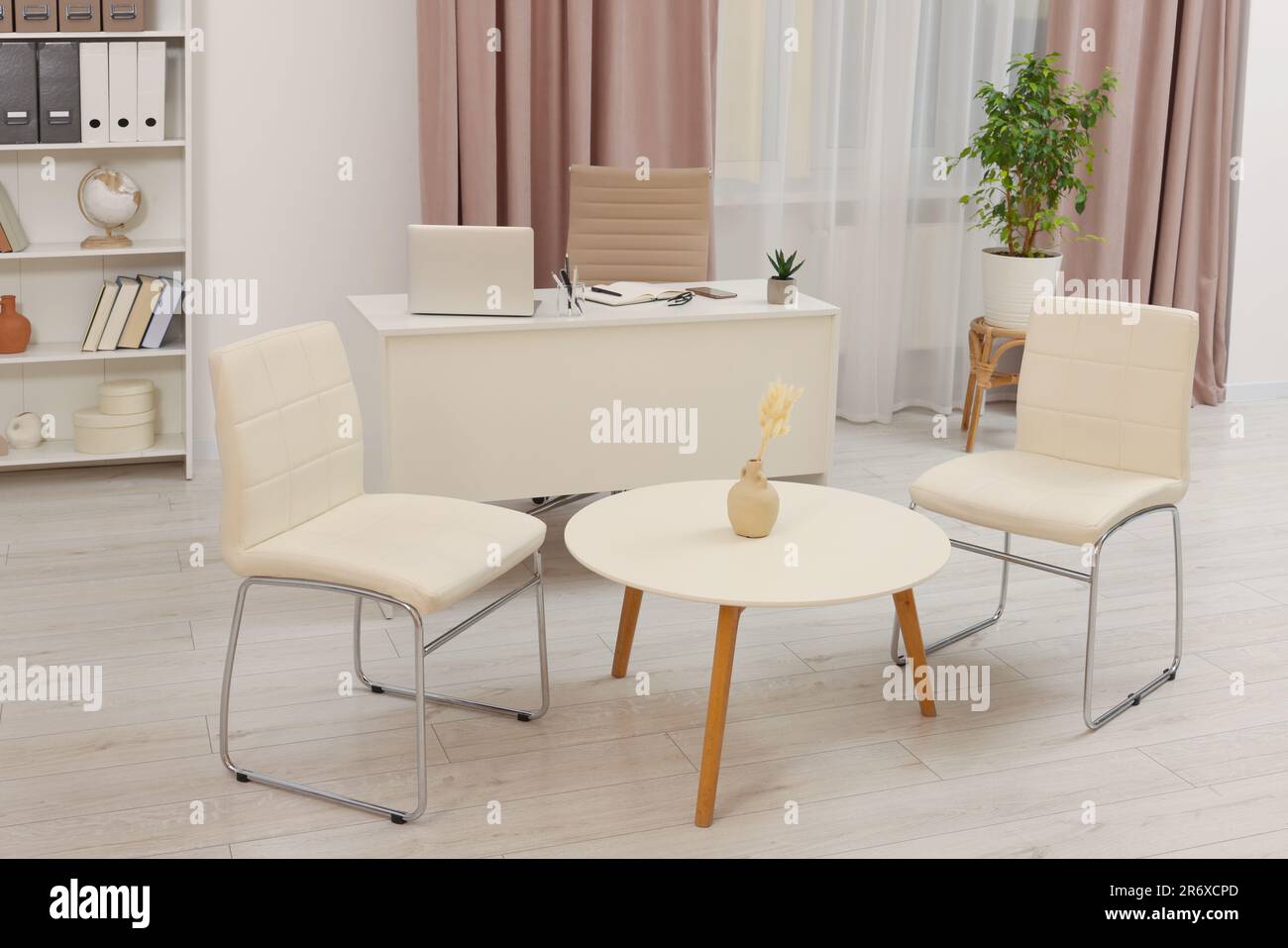 Modern office with comfortable waiting area and reception desk ...