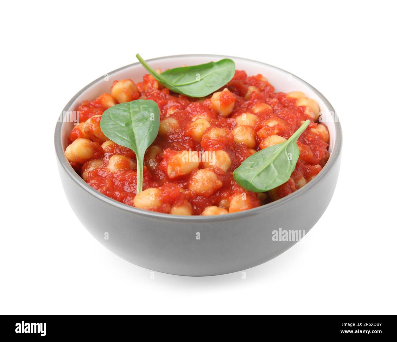 Delicious chickpea curry with basil on white background Stock Photo - Alamy