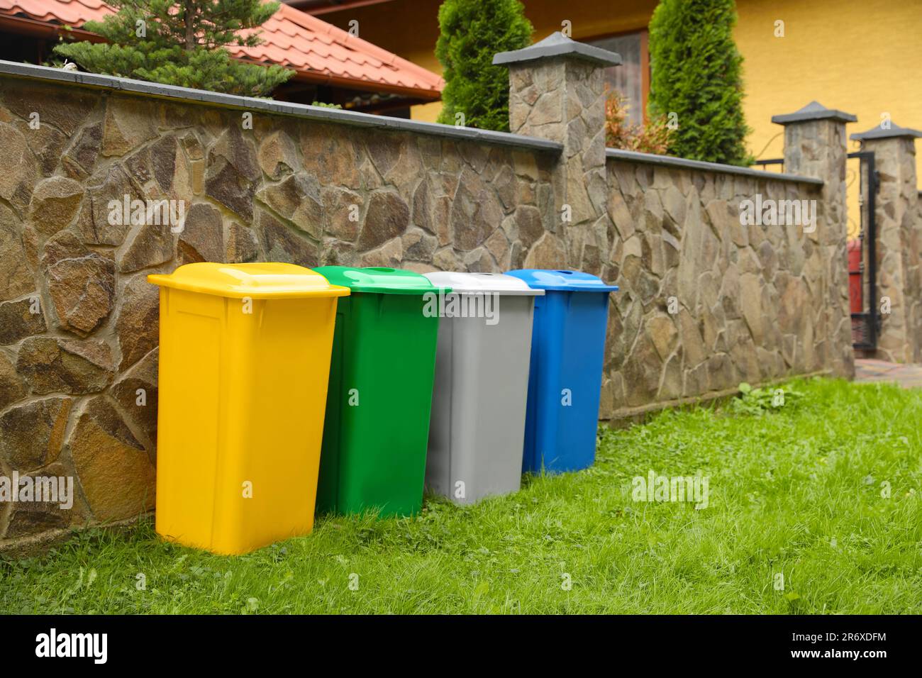 Recycling bins separating rubbish hi-res stock photography and images ...