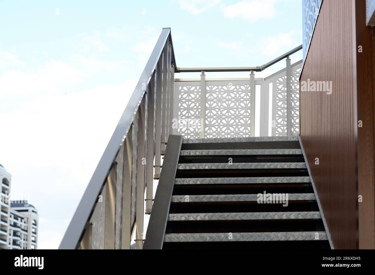 View of metal outdoor stairs with railing Stock Photo - Alamy