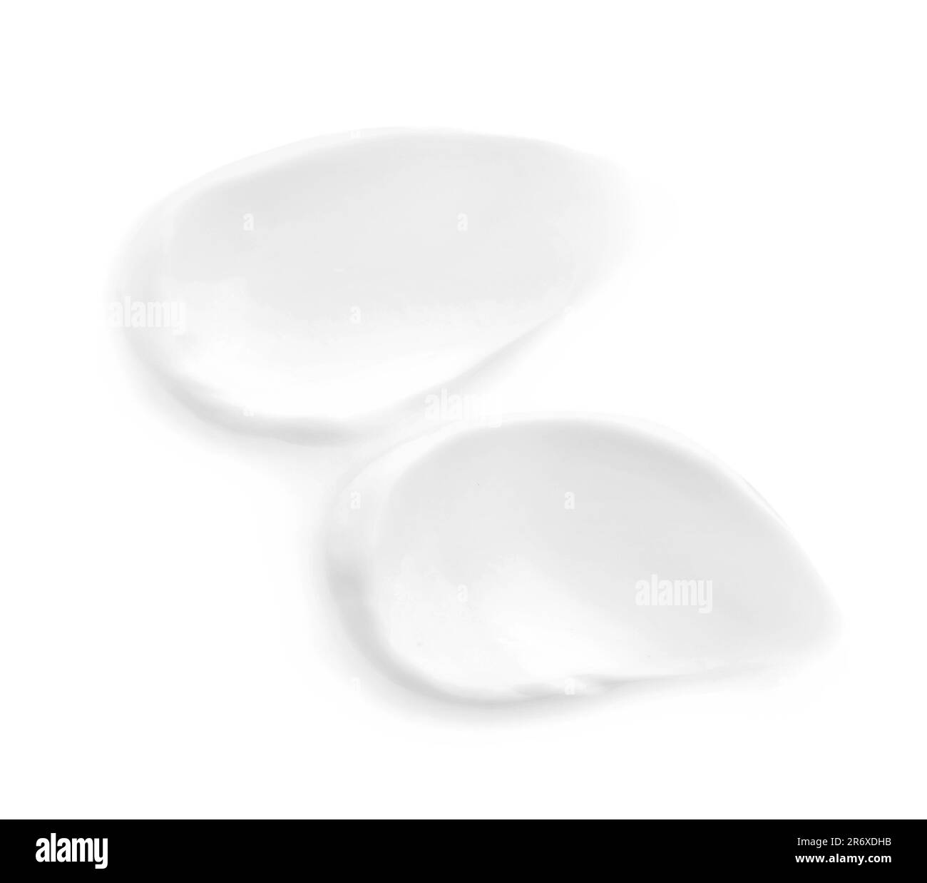 Creamy smears white cosmetic Black and White Stock Photos & Images - Alamy