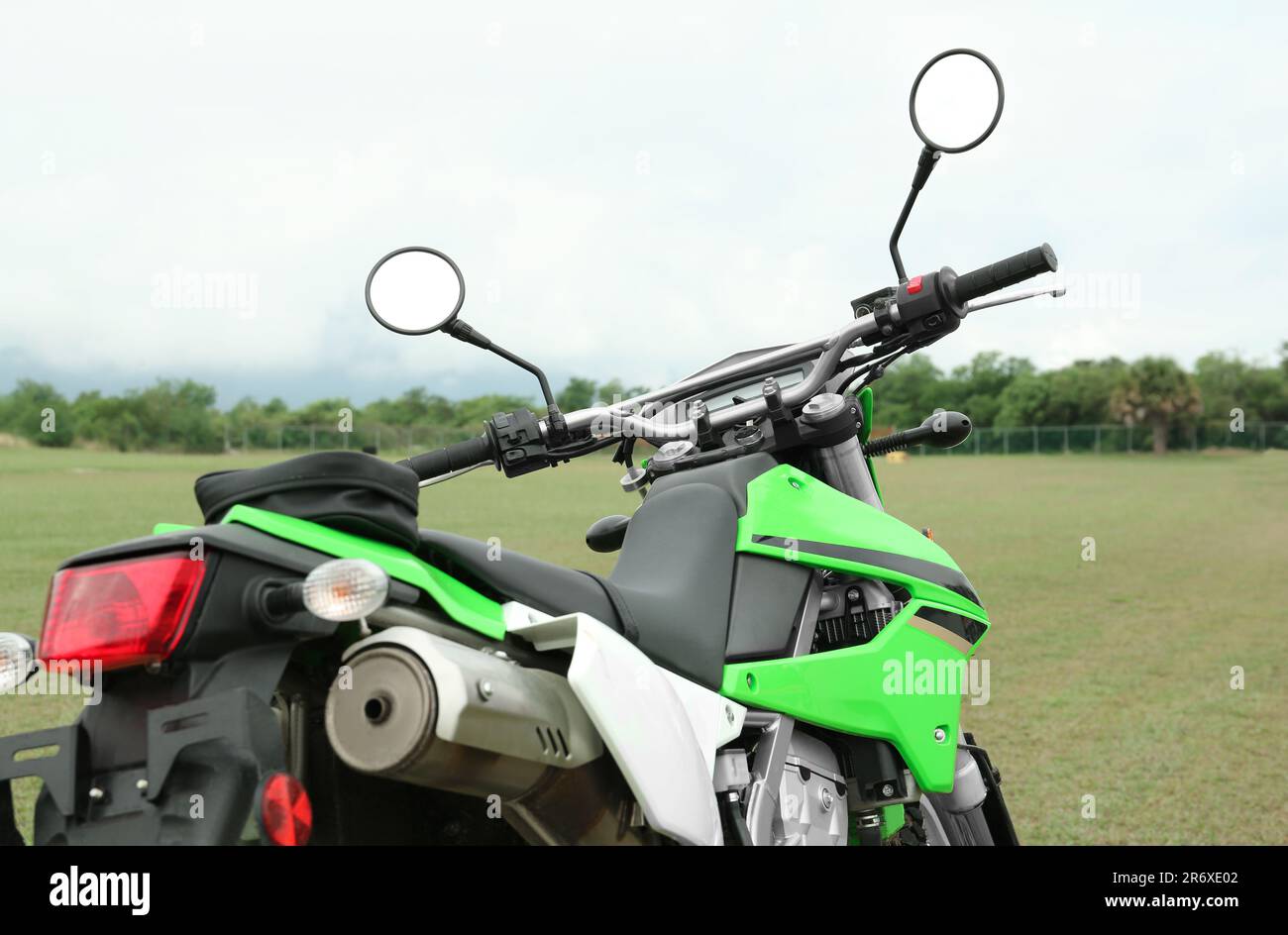 Motorcycle on grass hi-res stock photography and images - Alamy