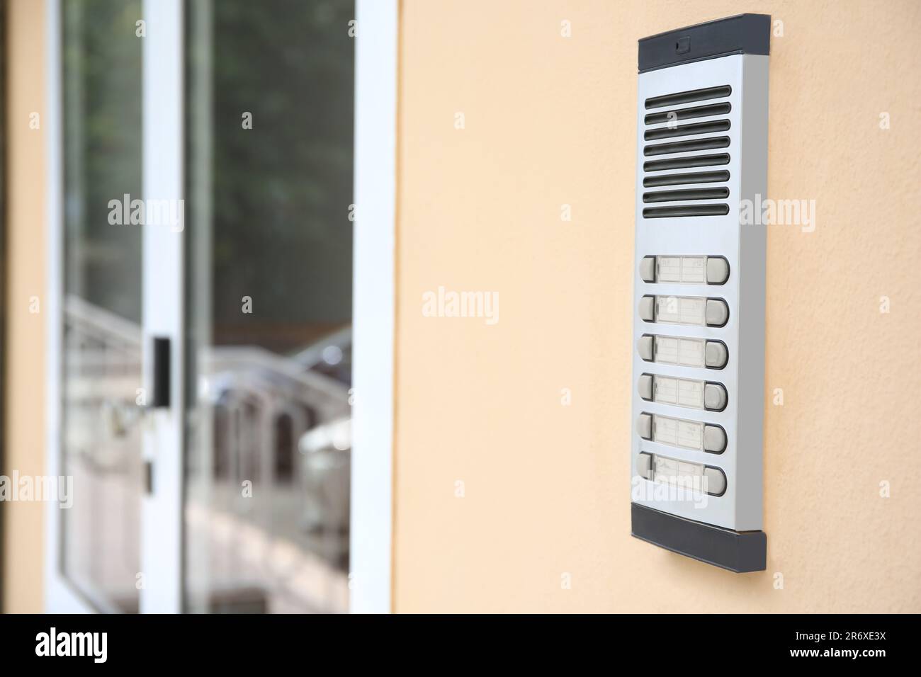 Modern intercom on beige wall, space for text. Security system Stock ...