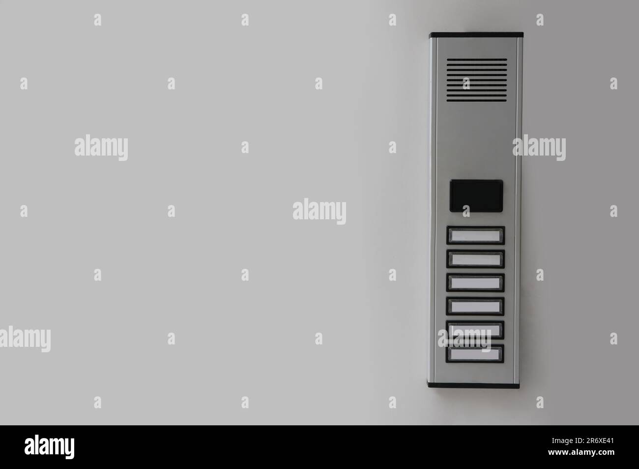 Modern intercom on white wall, space for text. Security system Stock ...