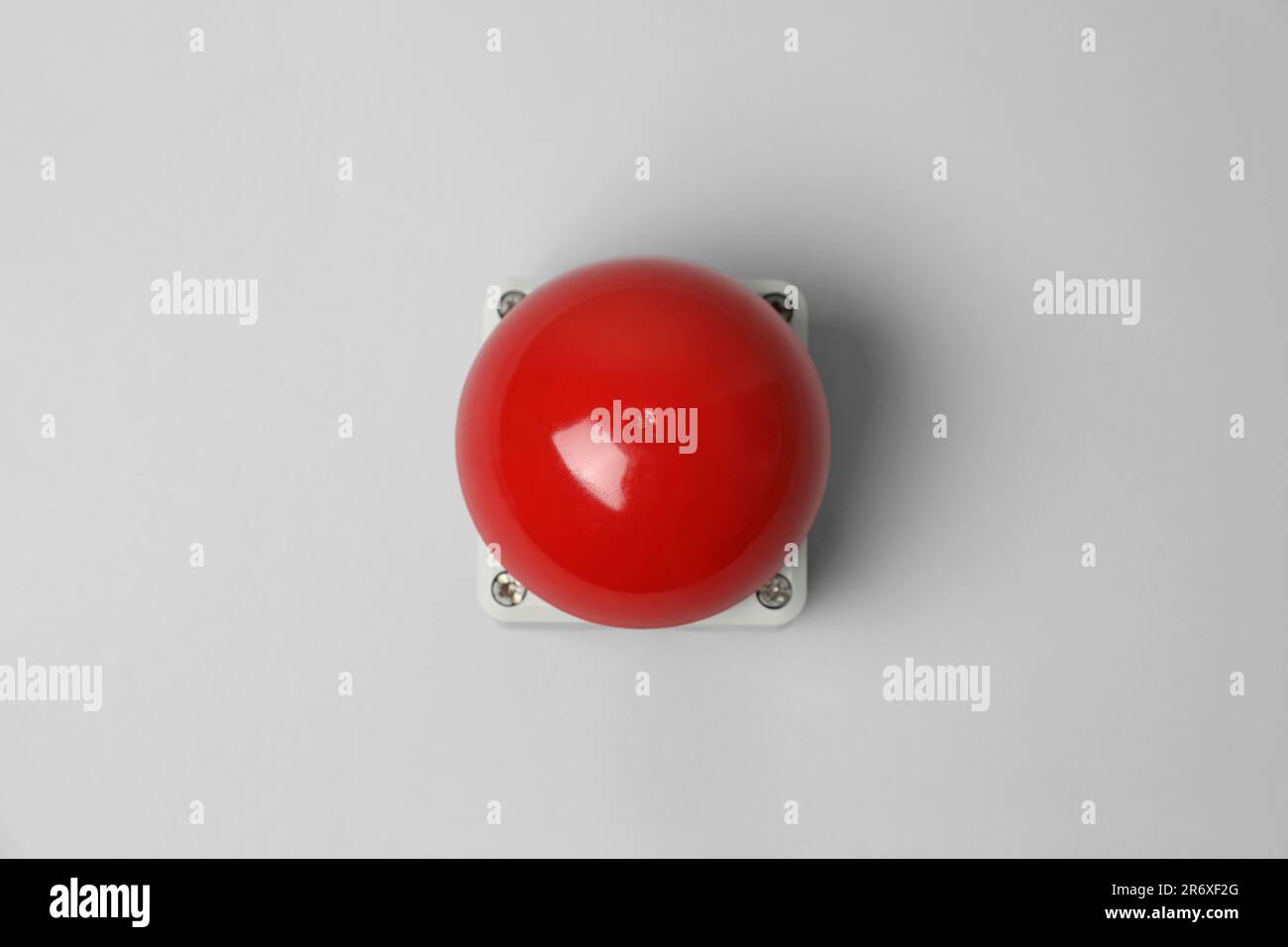 Red button of nuclear weapon on light gray background, top view. War ...