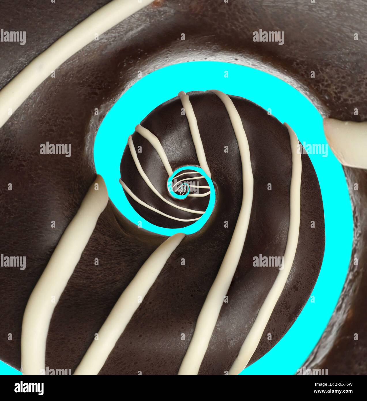 Twisted donut with chocolate icing and topping on cyan background ...