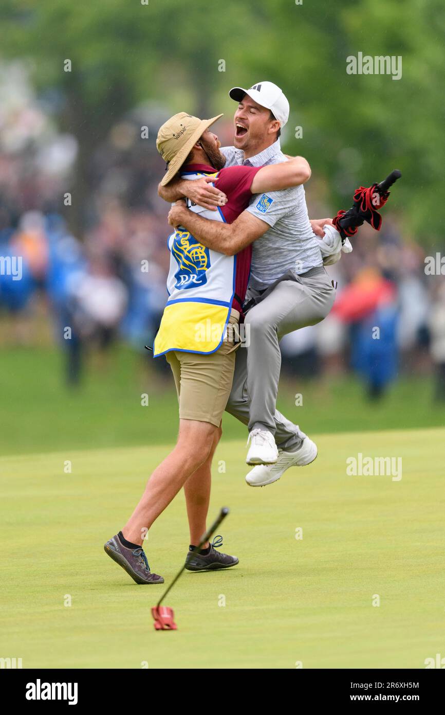 TORONTO, ON - JUNE 11: Nick Taylor of Canada celebrates with his caddie ...