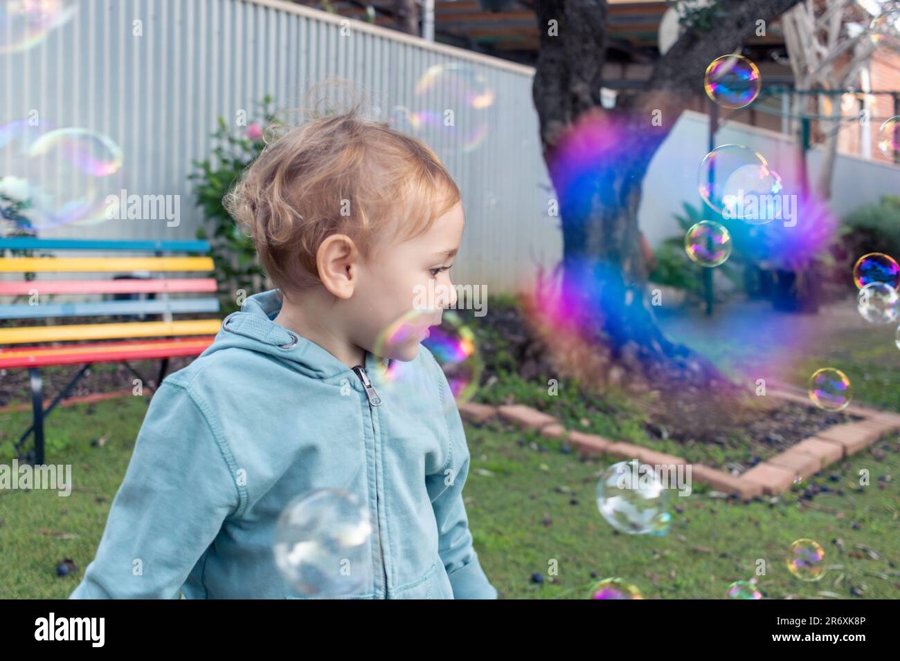 Bubble wand kid hi-res stock photography and images - Alamy