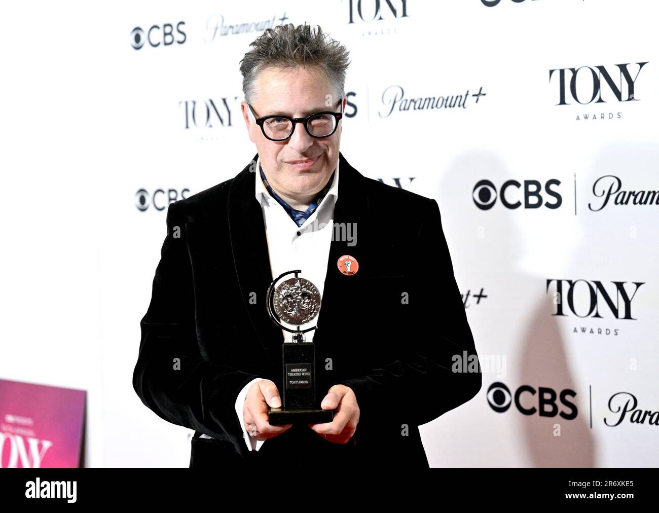 Patrick Marber poses in the press room with the award for best ...