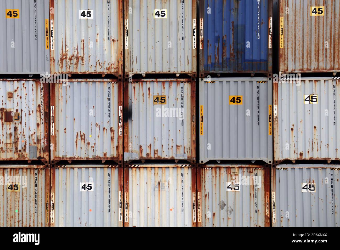 Containers from several shipping companies are seen stacked at the Port ...
