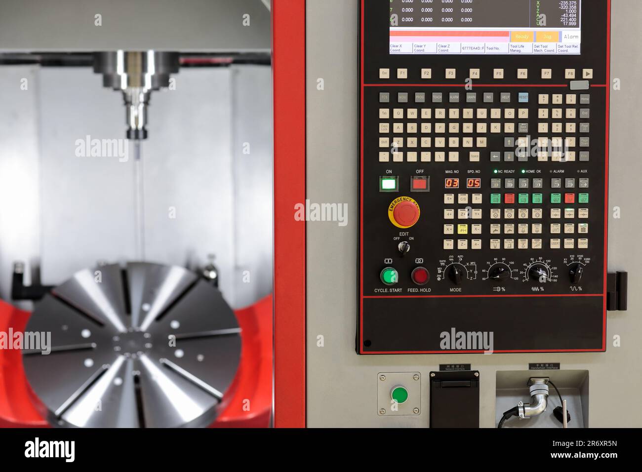 5 axis vertical CNC milling machine center. Selective focus Stock Photo ...